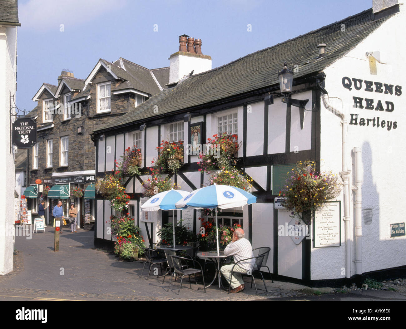 Hawkshead village Lake District tourism walking area in Cumbia man ...