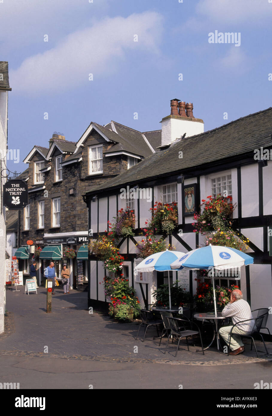 Hawkshead village Lake District tourism walking area in Cumbia man ...