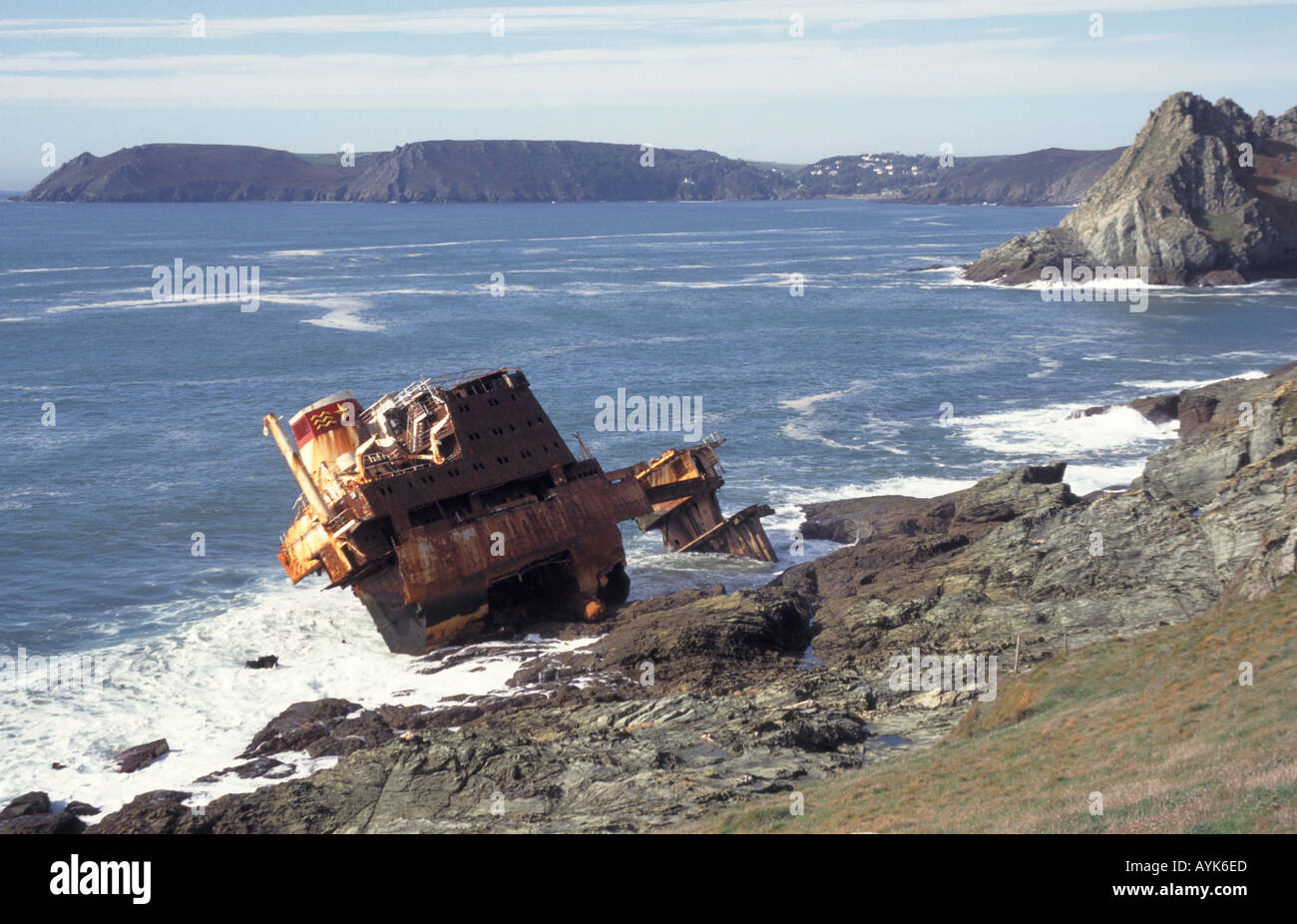 South Devon rocky coastline & rust on shipwreck of cargo ship MV ...