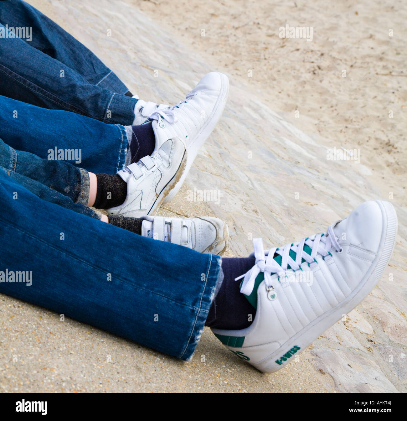Mans legs on beach hi-res stock photography and images - Alamy