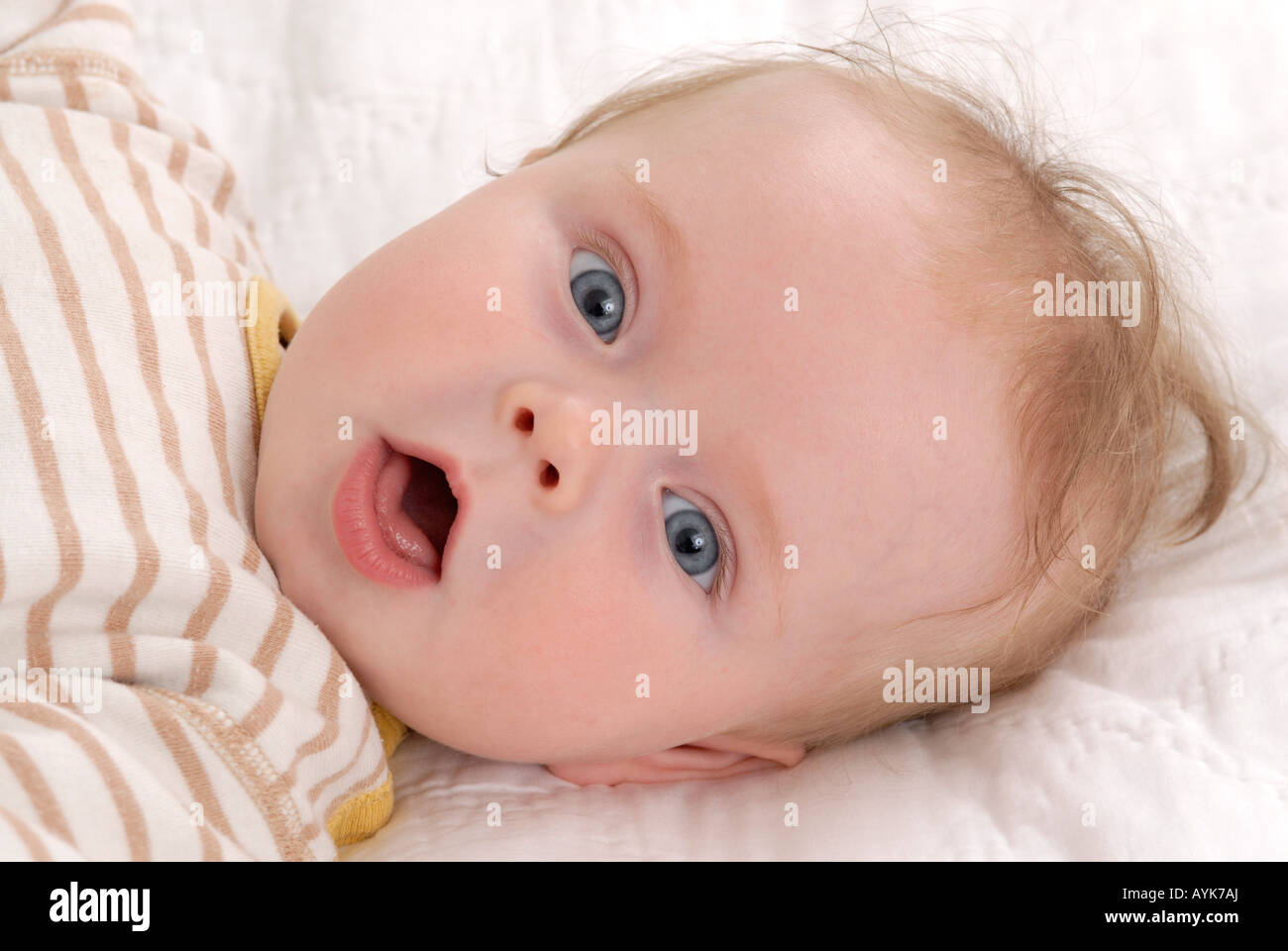 Close-up of a baby boy with open mouth Stock Photo - Alamy