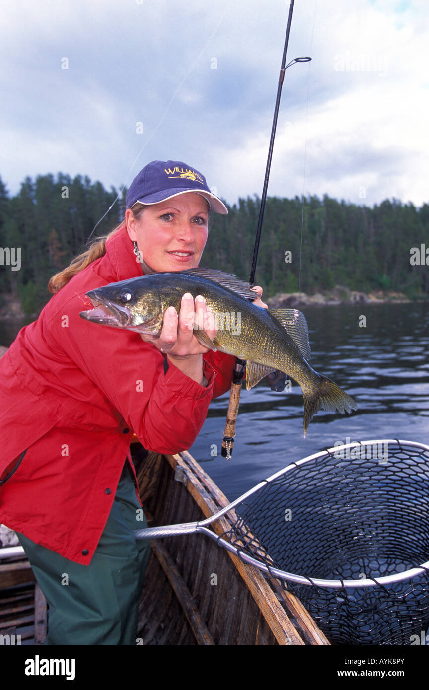 woman angler with walleye Stock Photo - Alamy
