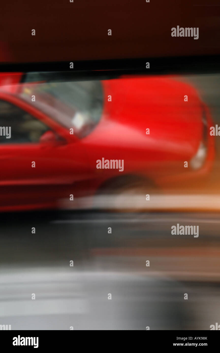 one abstract blurred fast car in rain Stock Photo - Alamy