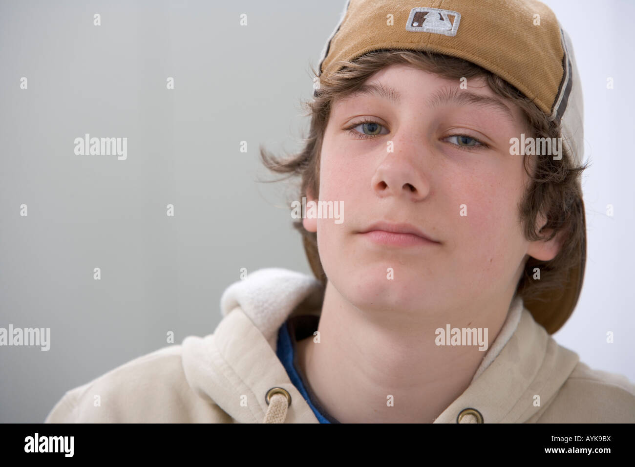 Portrait of a teenage boy with cap Stock Photo - Alamy
