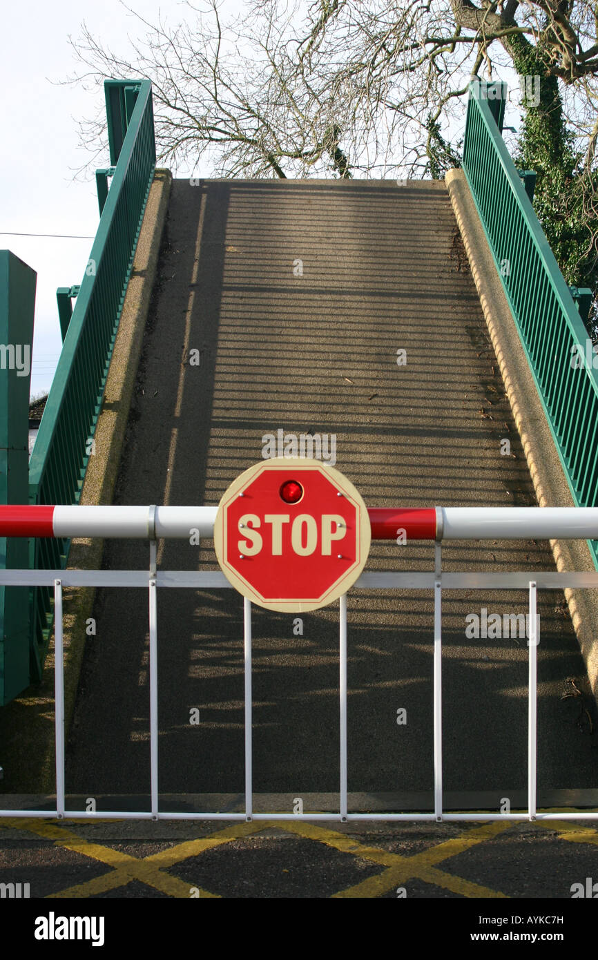 raised bascule road river green bridge stop sign Stock Photo - Alamy