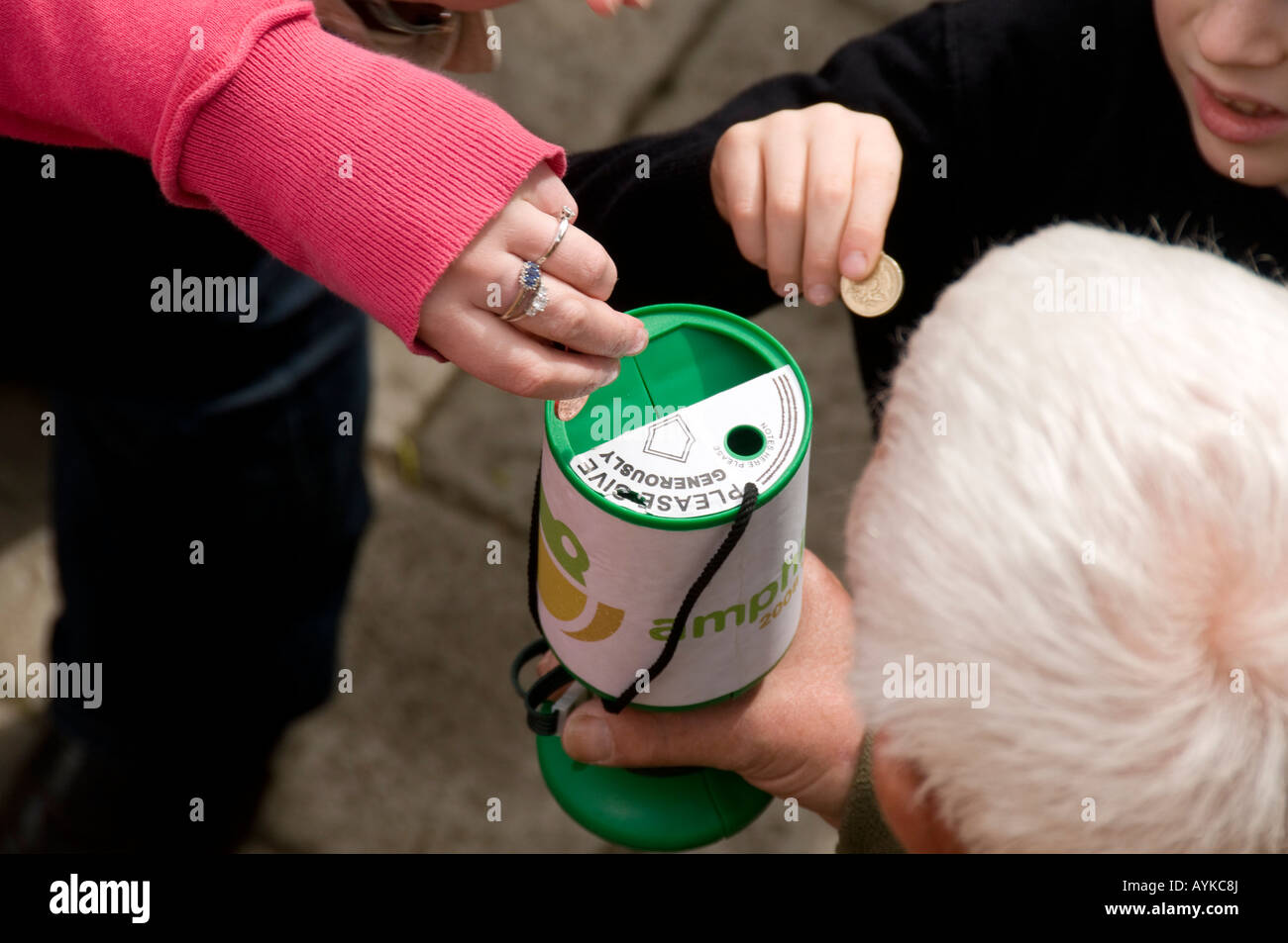 A man collecting charitable donations to help animal research at West ...