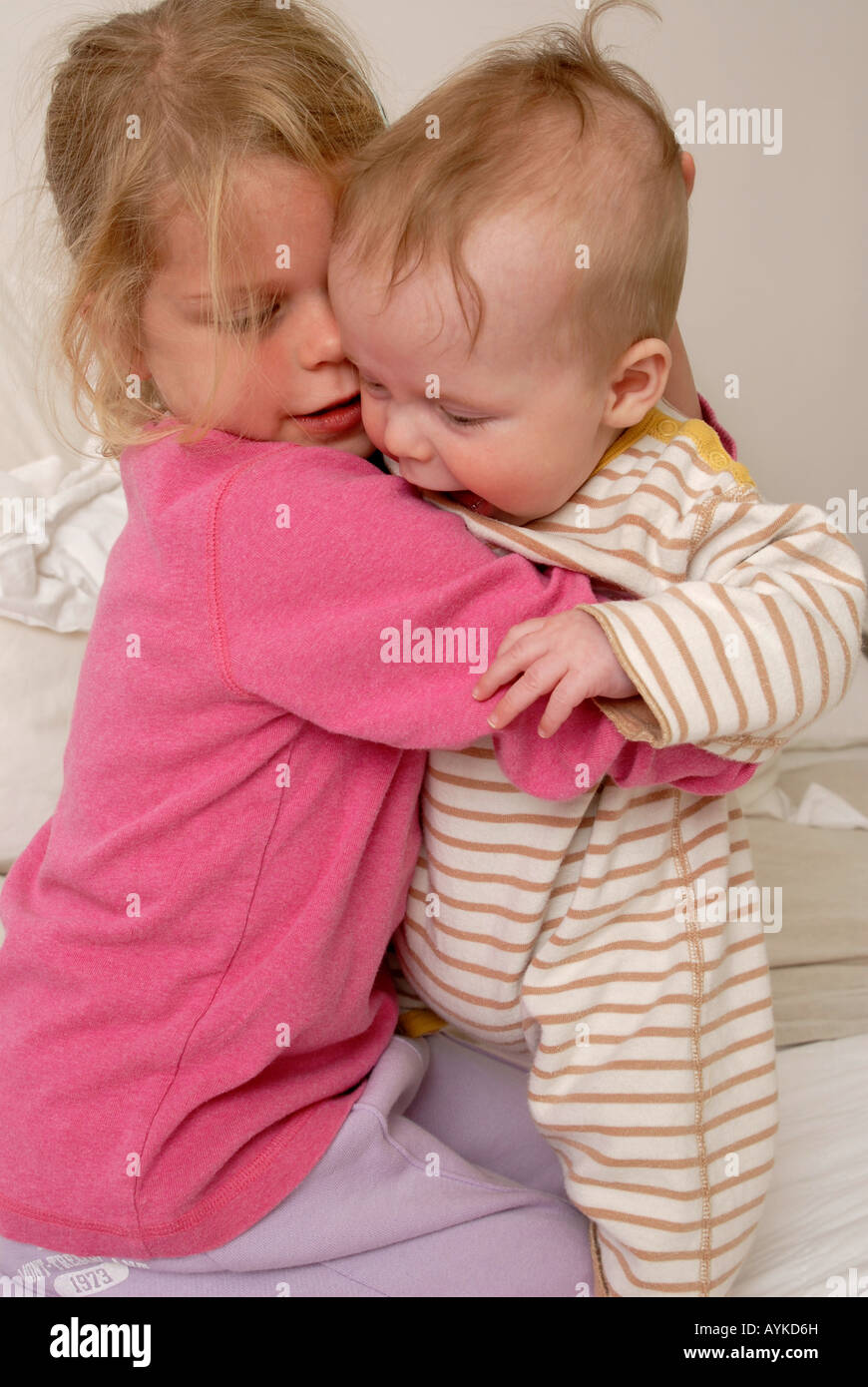Older sister caring for siblings hi-res stock photography and images ...