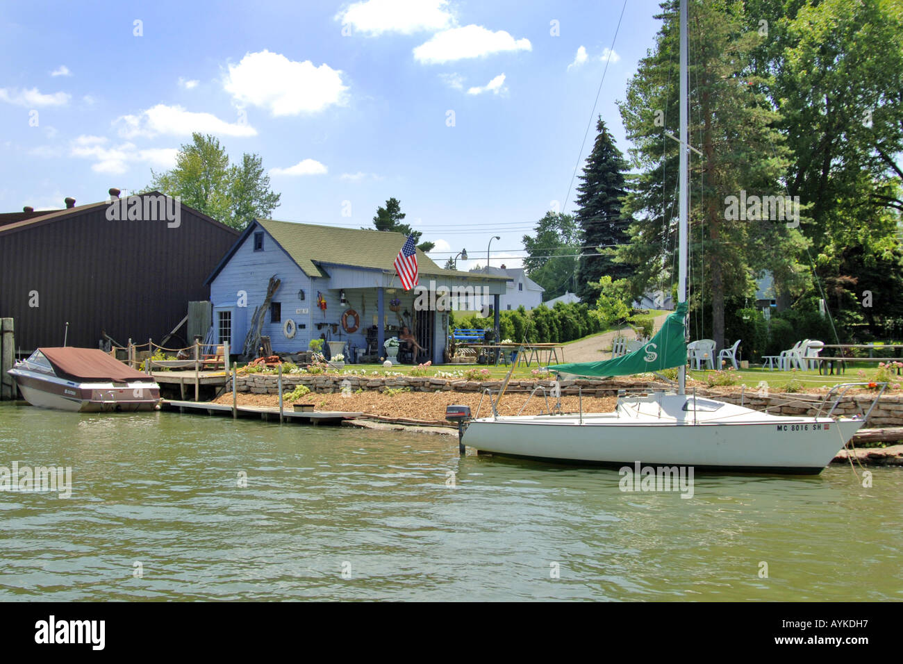 Old boat house on the Black River Michigan Stock Photo - Alamy