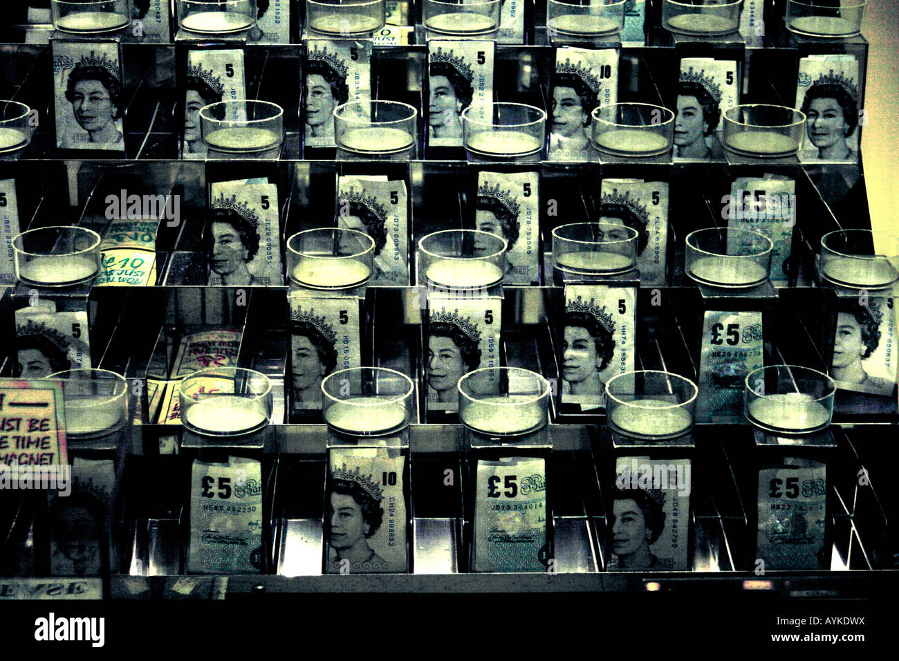 Five pound notes on display as prizes in amusement arcade game Stock ...