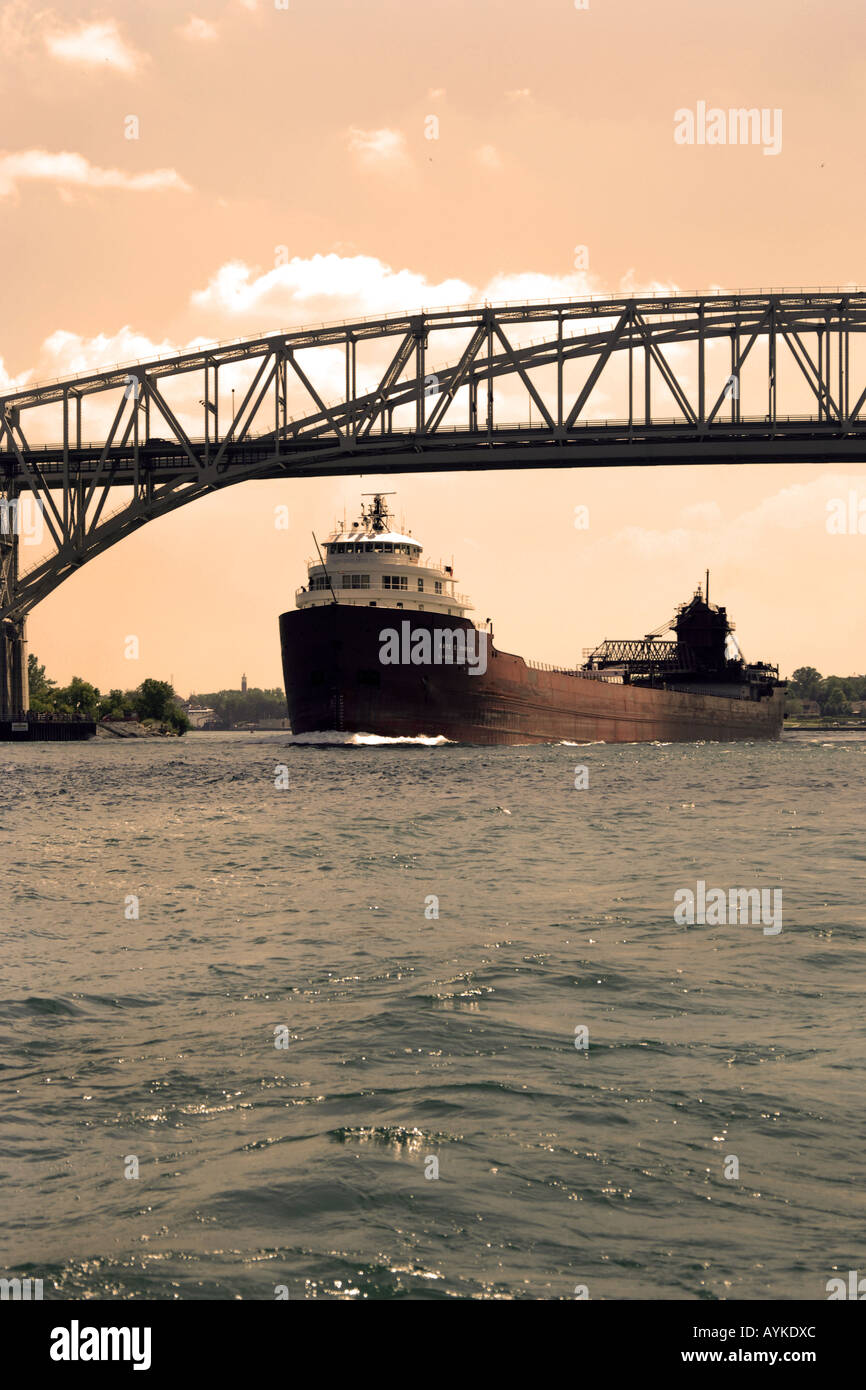 A Lake Freighter passes under the Blue Water Bridge Port Huron MI Stock ...