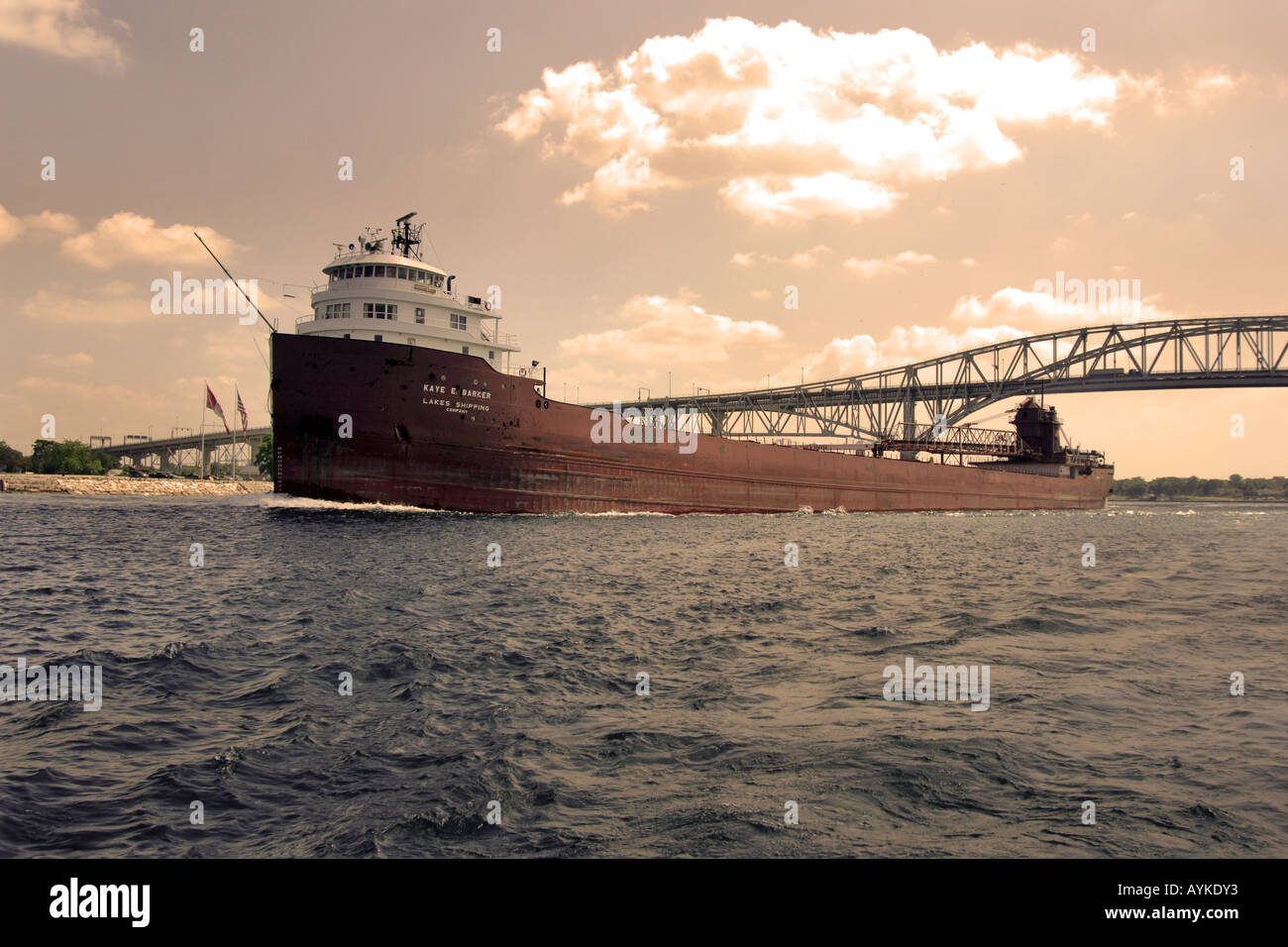 A Lake Freighter passes under the Blue Water Bridge Port Huron MI Stock ...