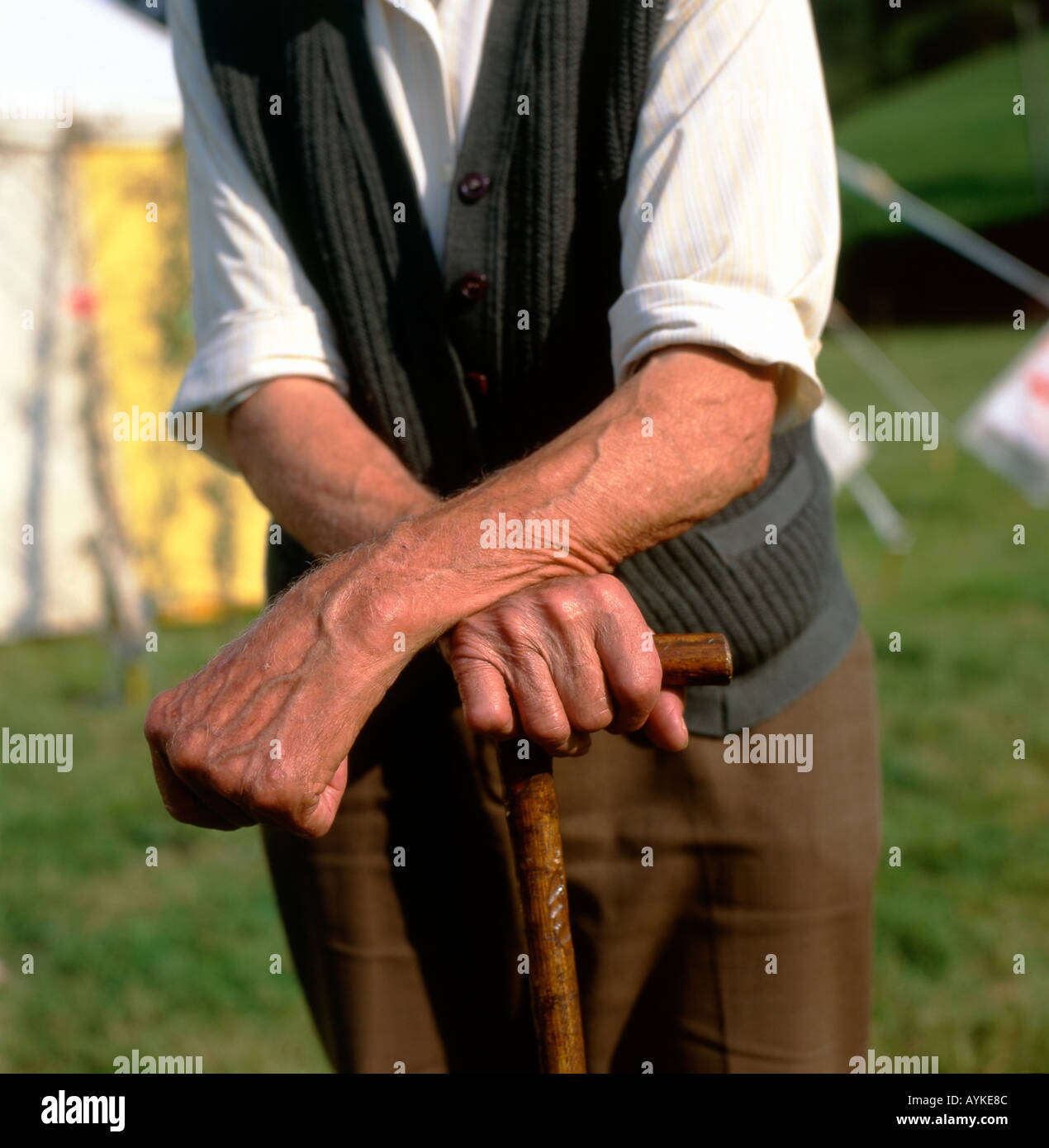 Leaning on walking stick hi-res stock photography and images - Alamy