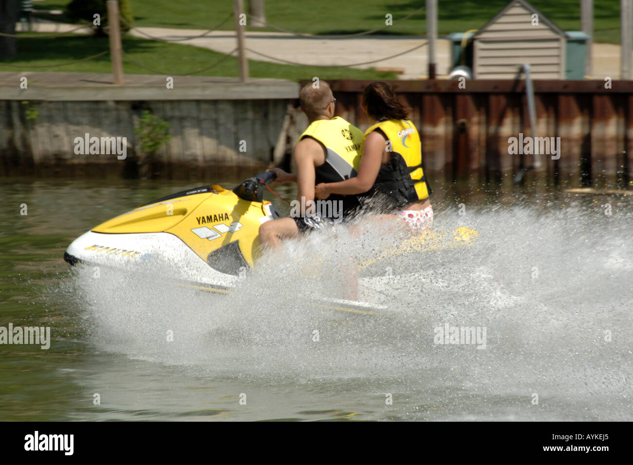 Two people riding jet hi-res stock photography and images - Alamy