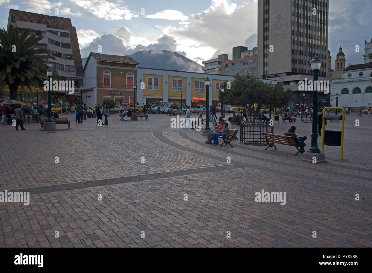 A plaza in the town of Pasto, Colombia, With Galeras Volcano shrouded ...