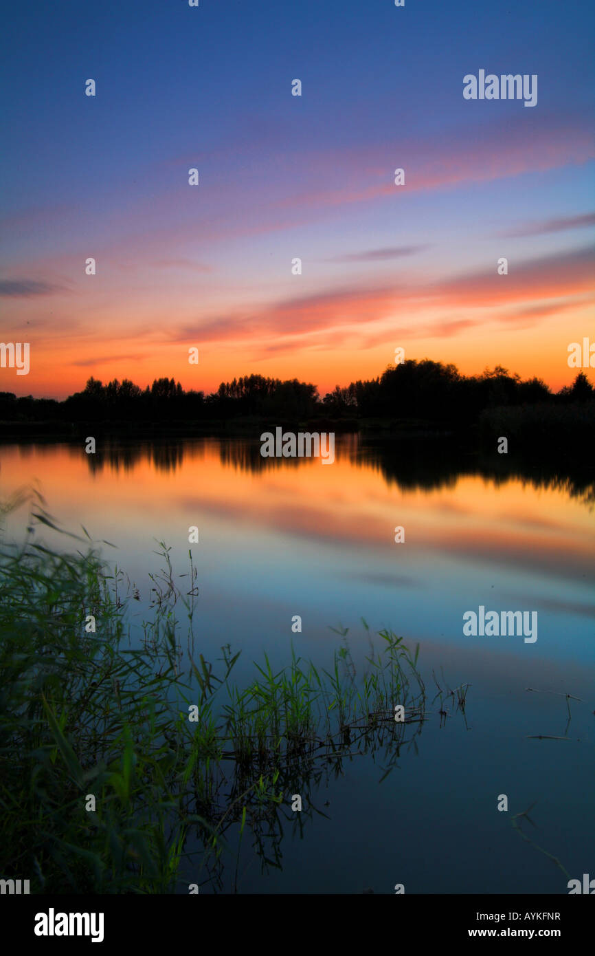 blue orange sunset over molden hill park Swindon Stock Photo - Alamy