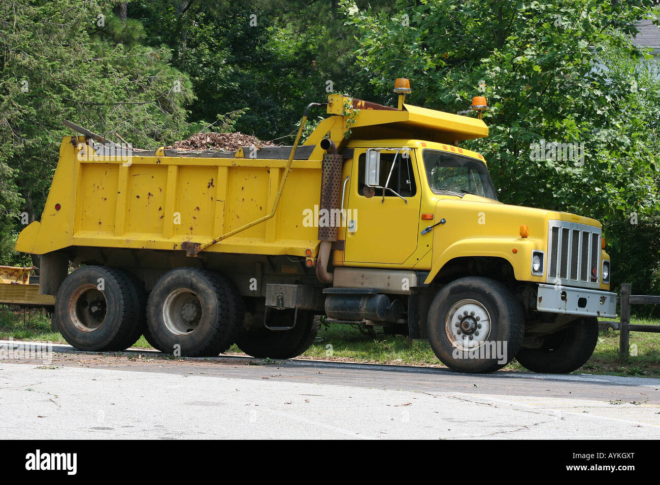 Yellow dump truck Stock Photo - Alamy