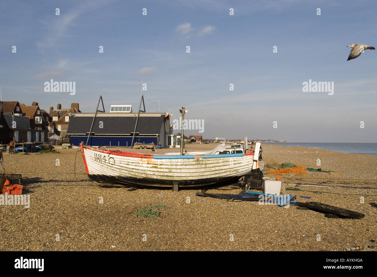 Aldeburgh beach looking towards the lifeboat building fishing boat and ...