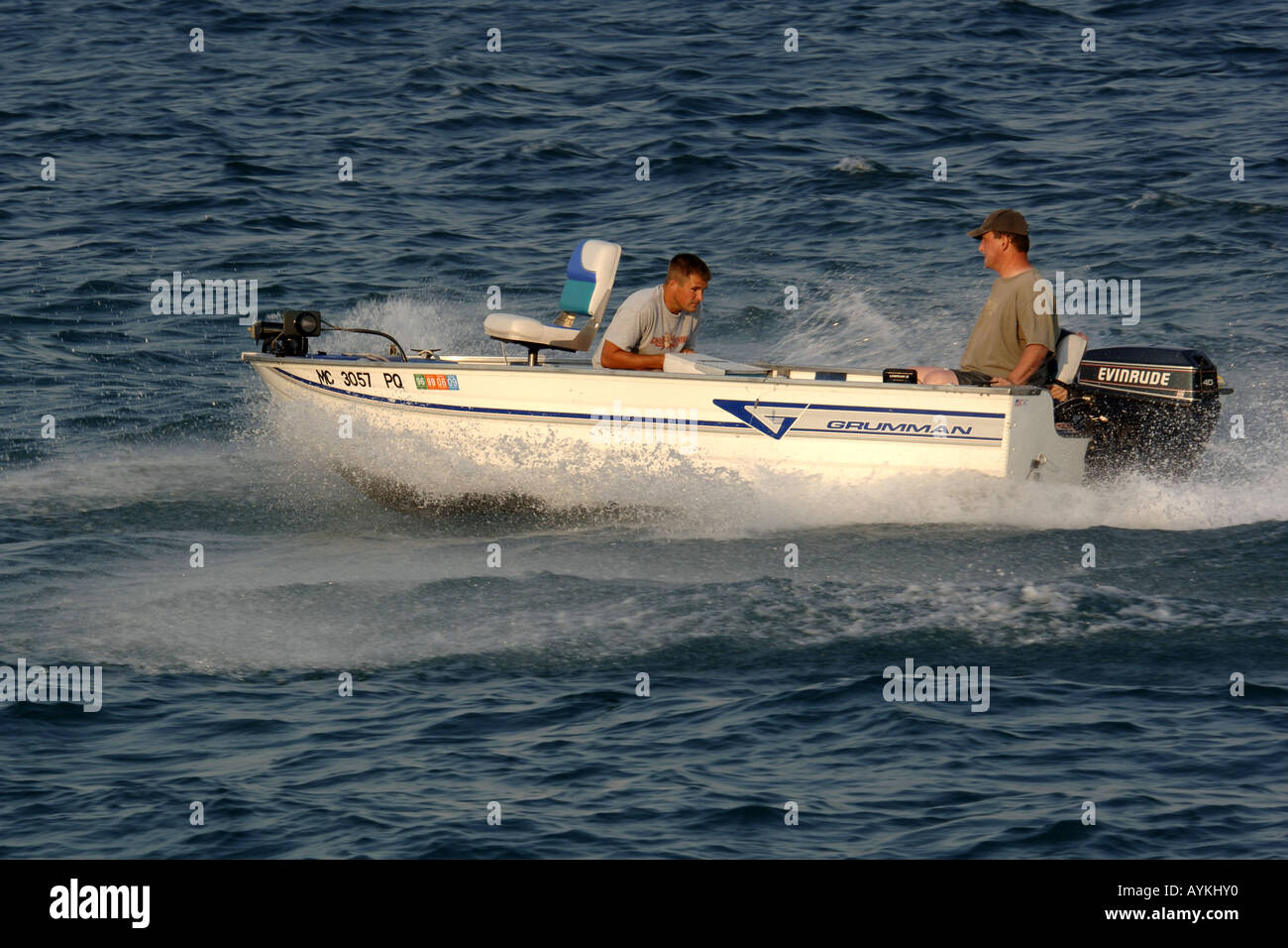 Small two man fishing boat with an outboard motor on the St Clair River ...