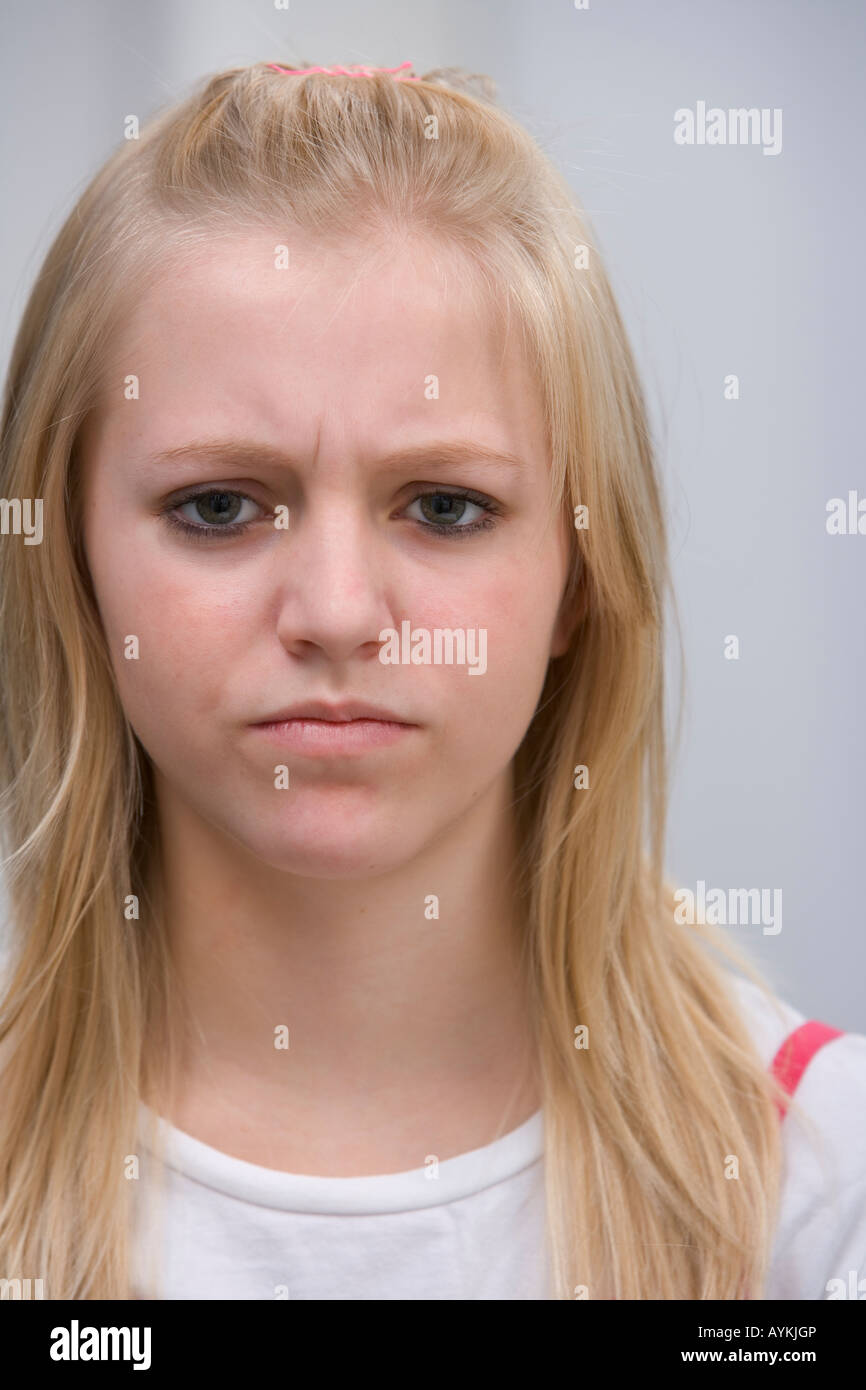 Portrait of a angry teenage girl Stock Photo - Alamy