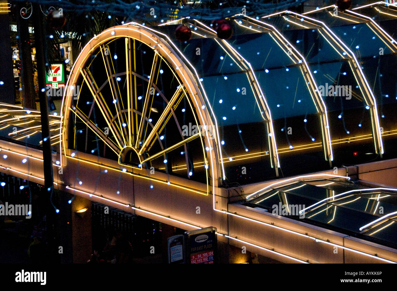 Exterior of glass atrium with neon lights Stock Photo - Alamy