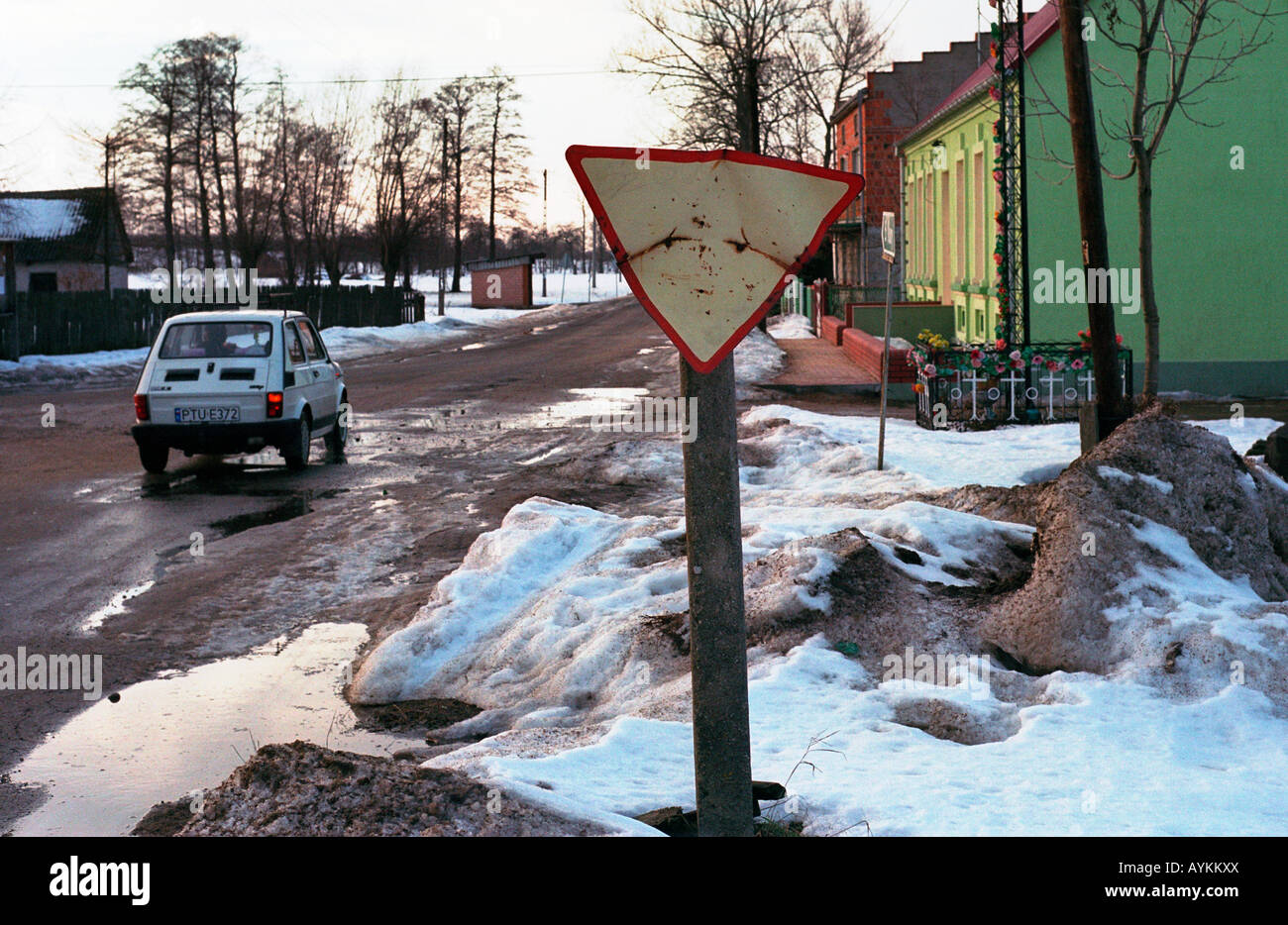 An old, damaged -give way- traffic sign, Natalia, Poland Stock Photo ...