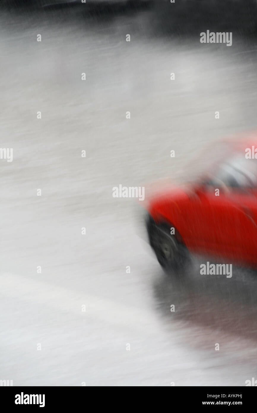 one abstract blurred fast car in rain Stock Photo - Alamy