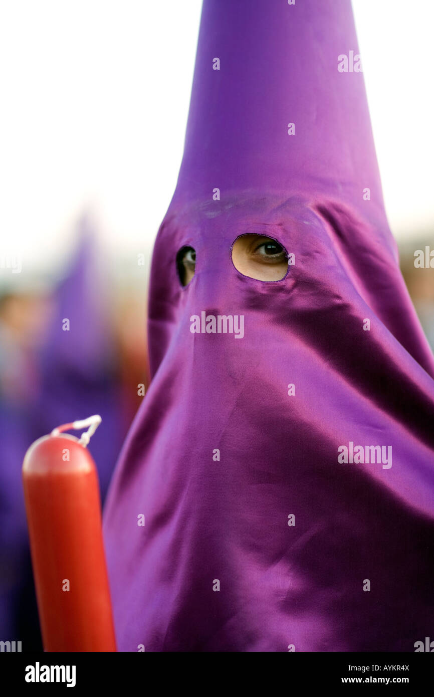 Penitent bearing candle, Good Friday, Seville, Spain Stock Photo - Alamy