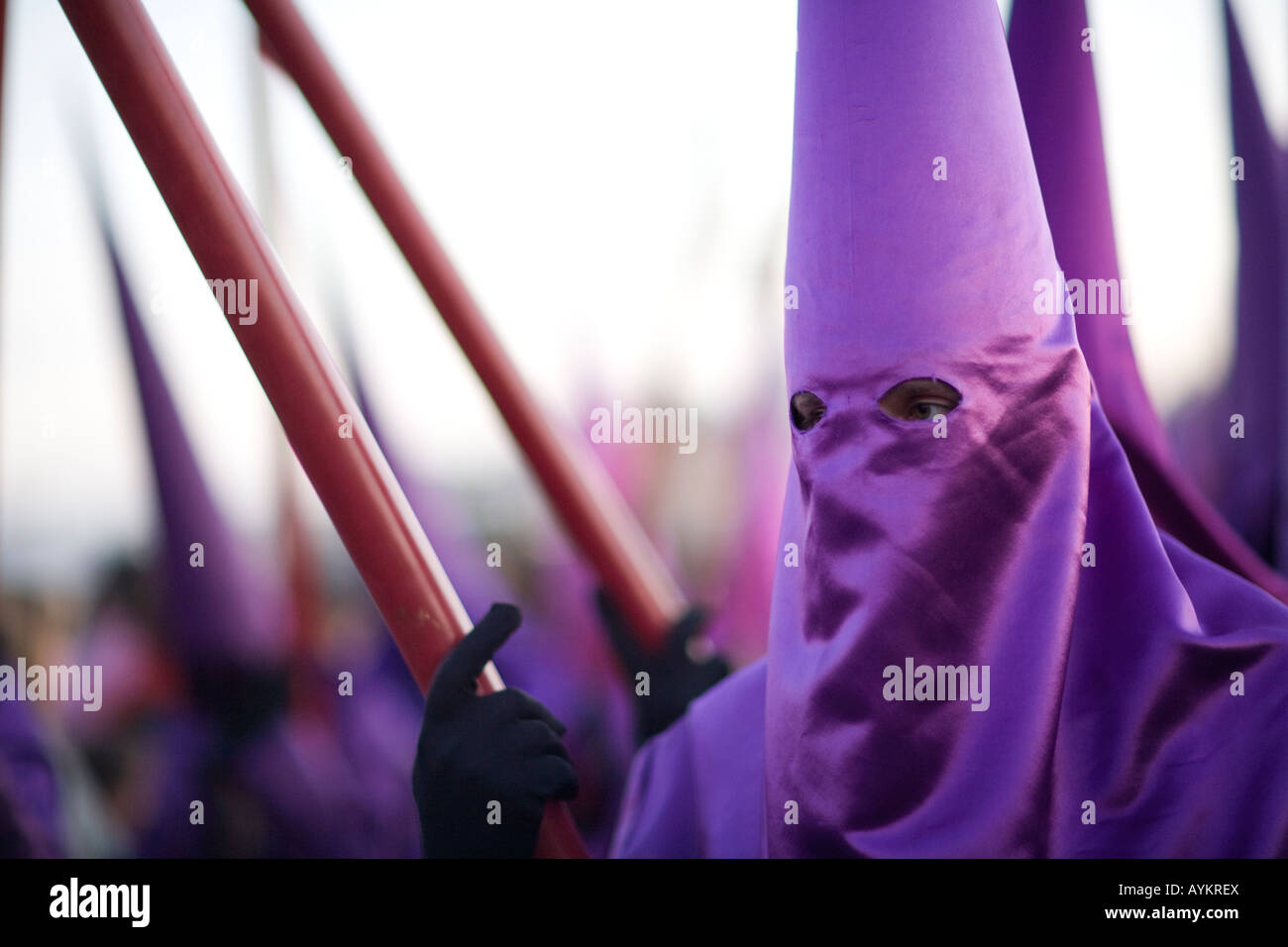 Penitent bearing candle, Good Friday, Seville, Spain Stock Photo - Alamy