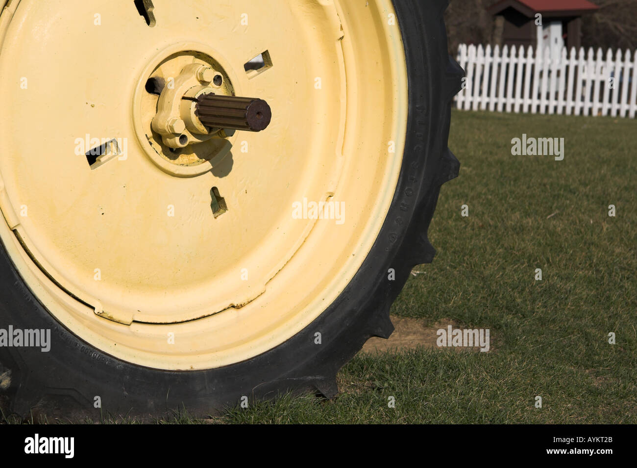 A close-up of an old tractor's wheel in a farm, early fall Stock Photo ...