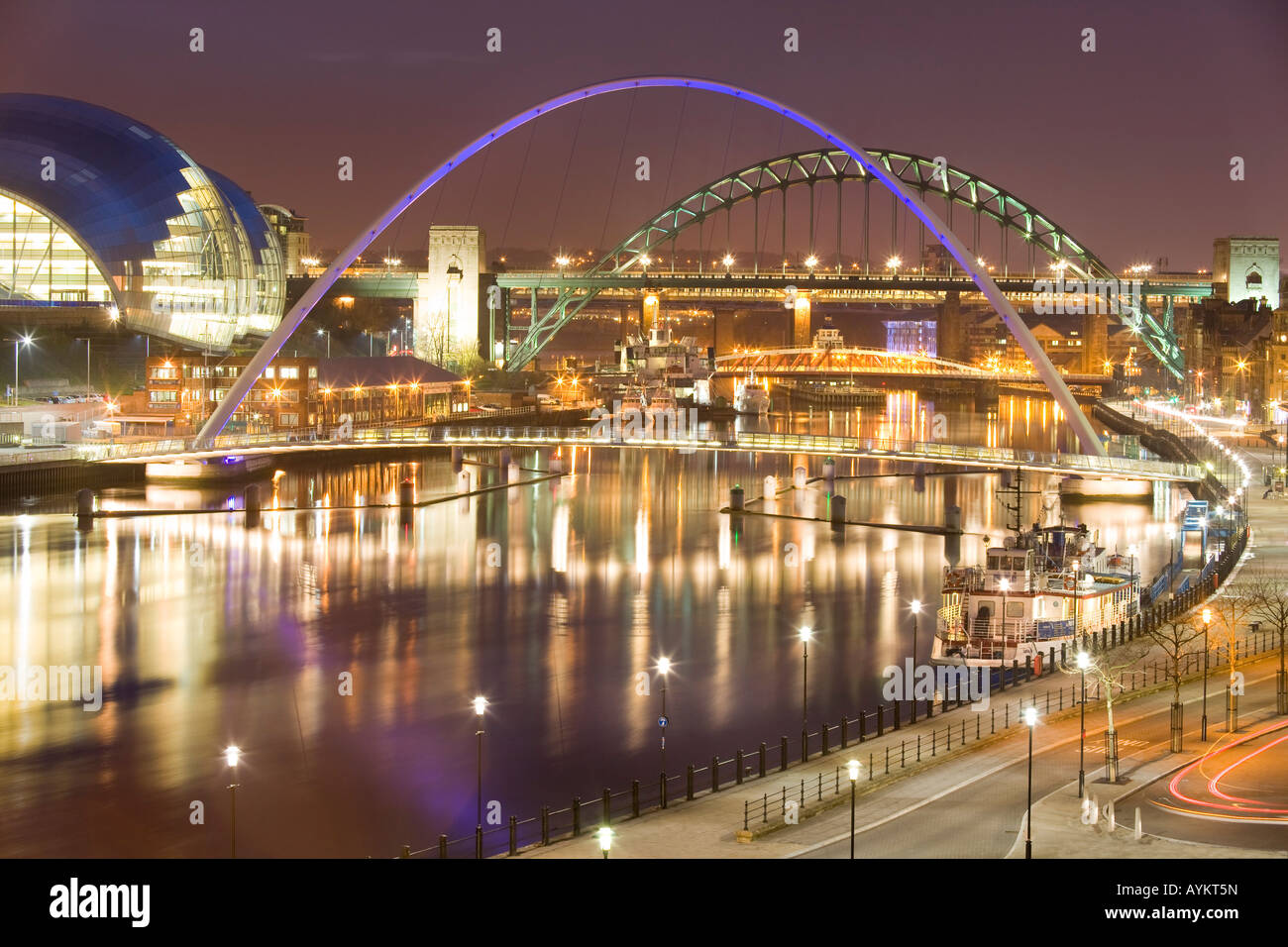 River Tyne quayside showing the Millennium and Tyne Bridges between ...