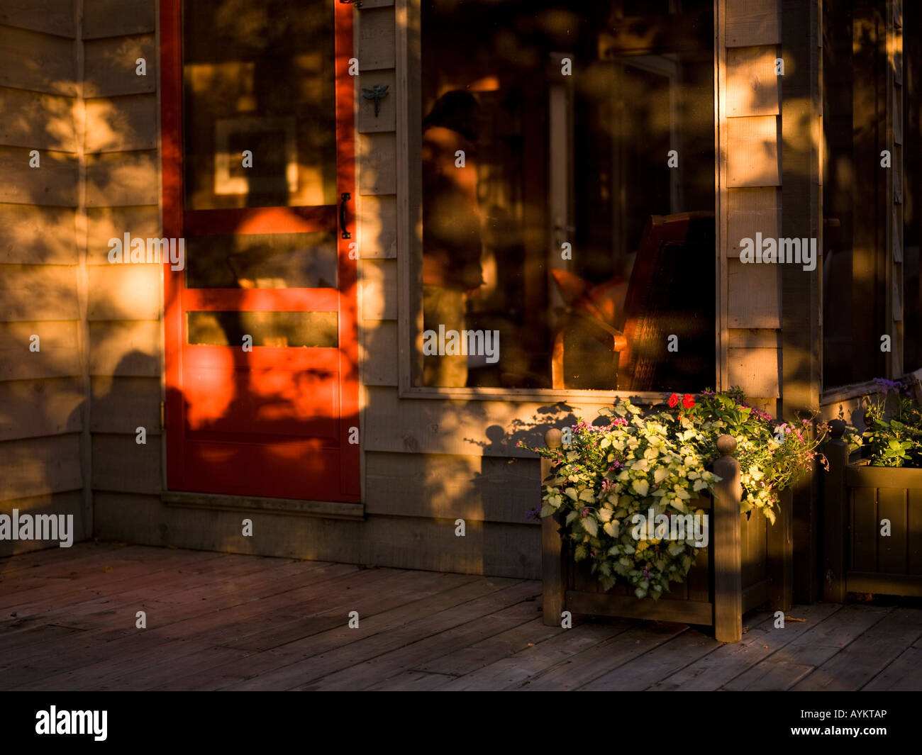 Sunset on the porch Stock Photo - Alamy