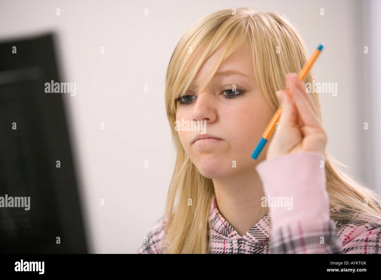 Teenage girl behind a computer Stock Photo - Alamy