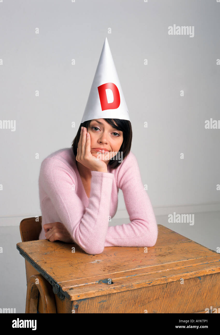 Woman wearing dunce cap sitting hi-res stock photography and images - Alamy Woman wearing dunce cap sitting hi-res stock photography and images - Alamy
