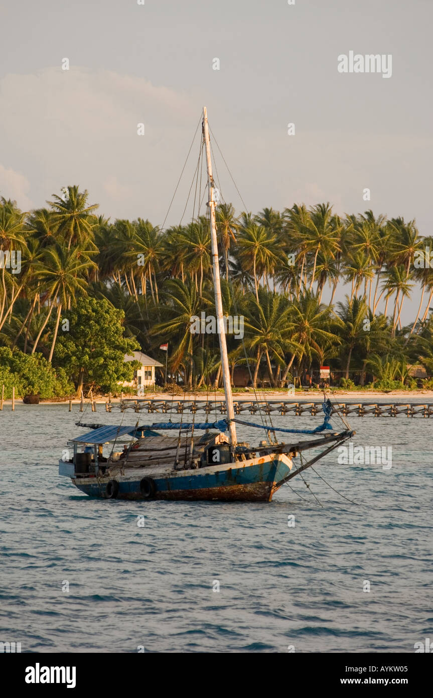 Small fishing boat in the lagoon of Mapia Atoll, West Papua, Indonesia ...