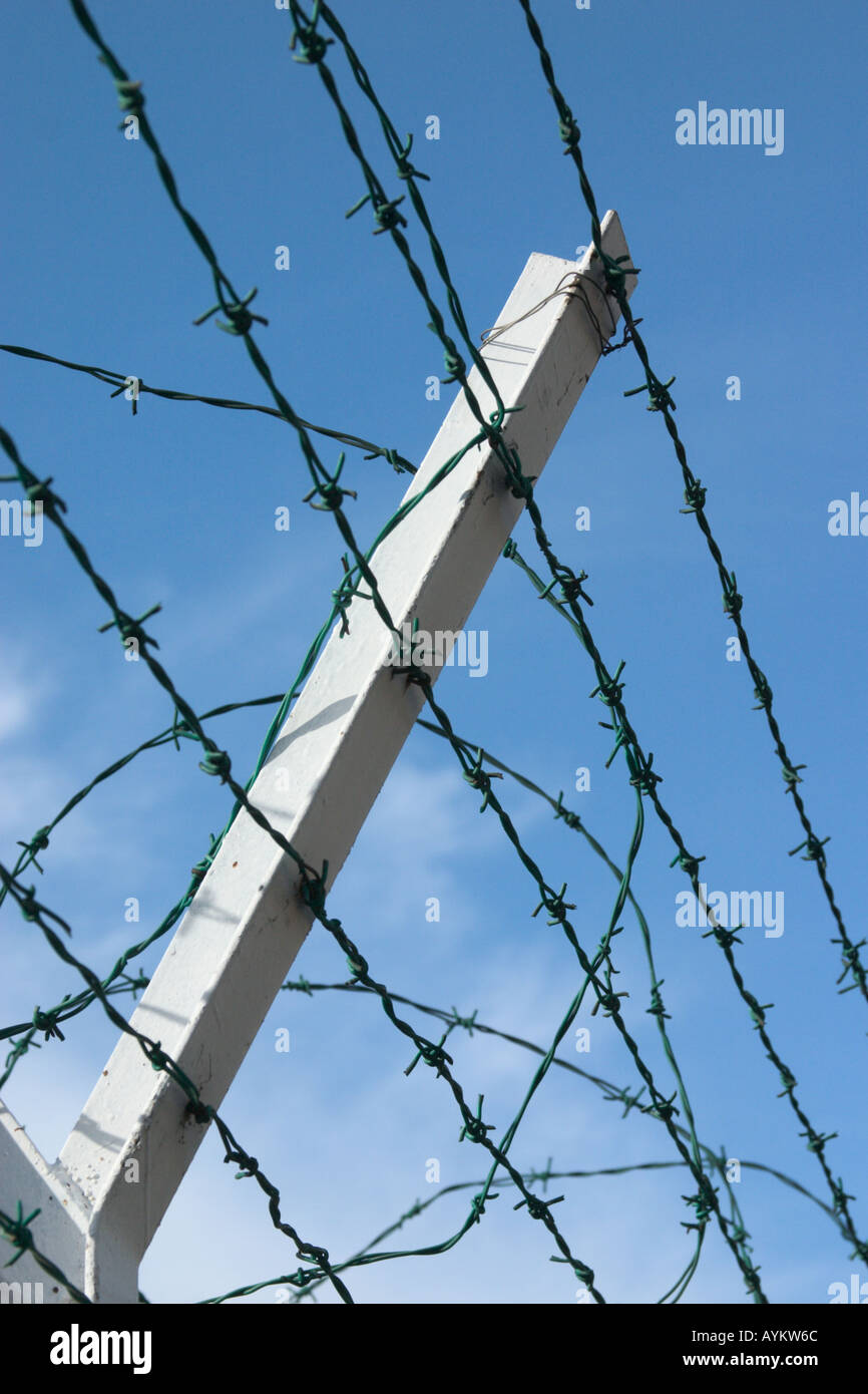 barbed wire fence concept prisoner security Stock Photo - Alamy
