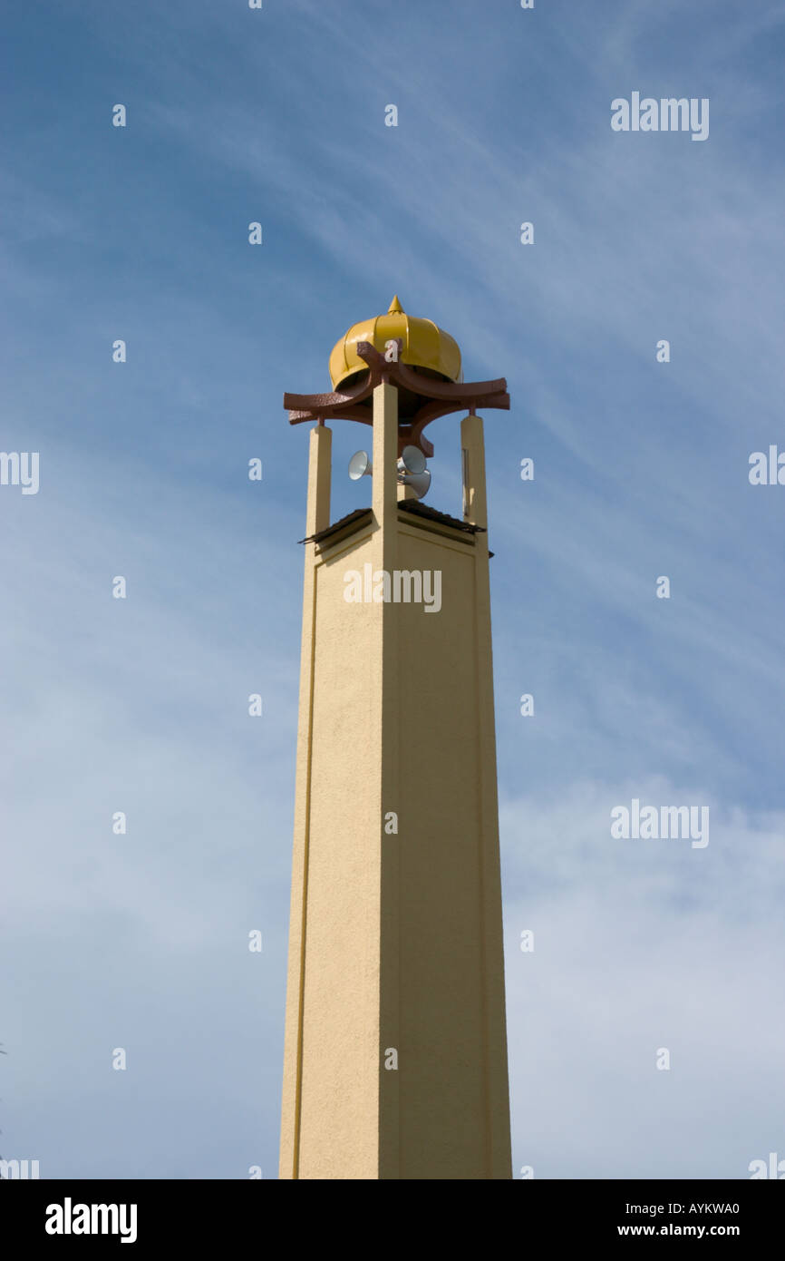 closeup of mosque minaret showing loudspeakers used to call for prayers ...