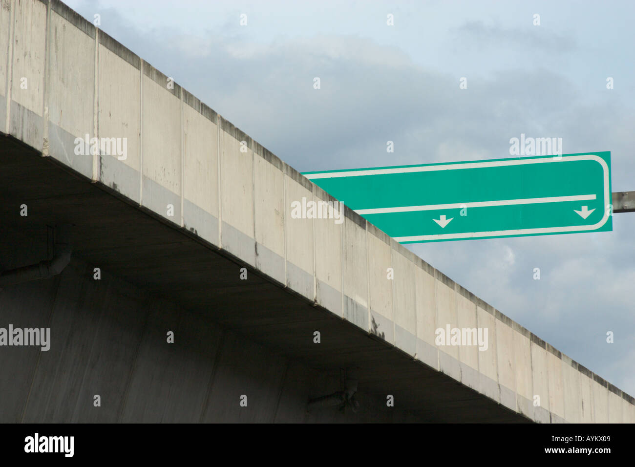 blank signboard with arrow on freeway Stock Photo - Alamy