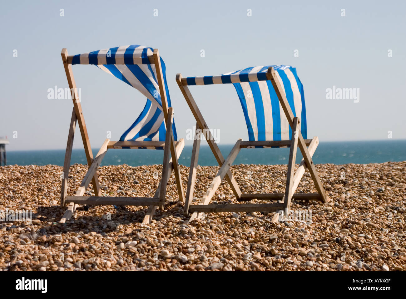 Wind blowing deckchairs hi-res stock photography and images - Alamy
