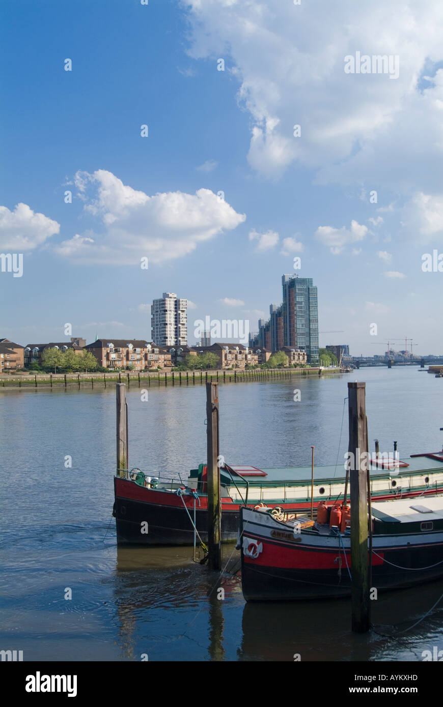 Thames house boats at Chelsea with view of Battersea London England UK ...