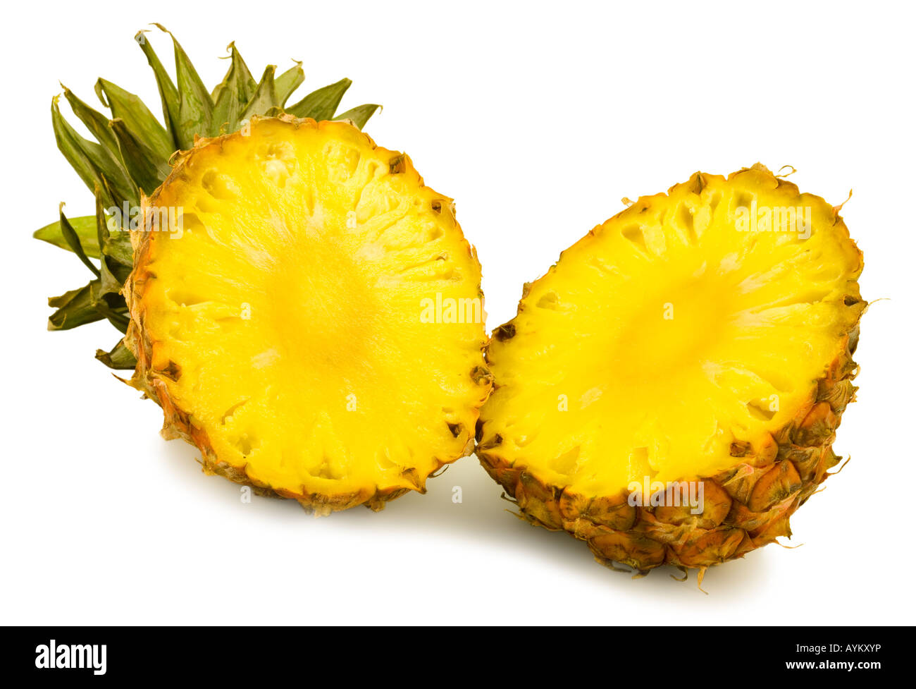 two halves of pineapple isolated on white background Stock Photo - Alamy