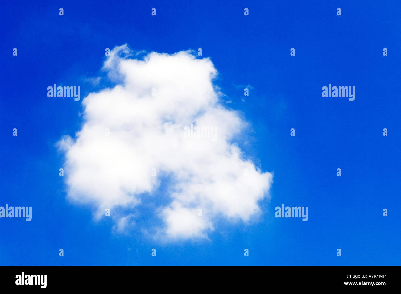 One white cloud floating against blue sky Stock Photo - Alamy