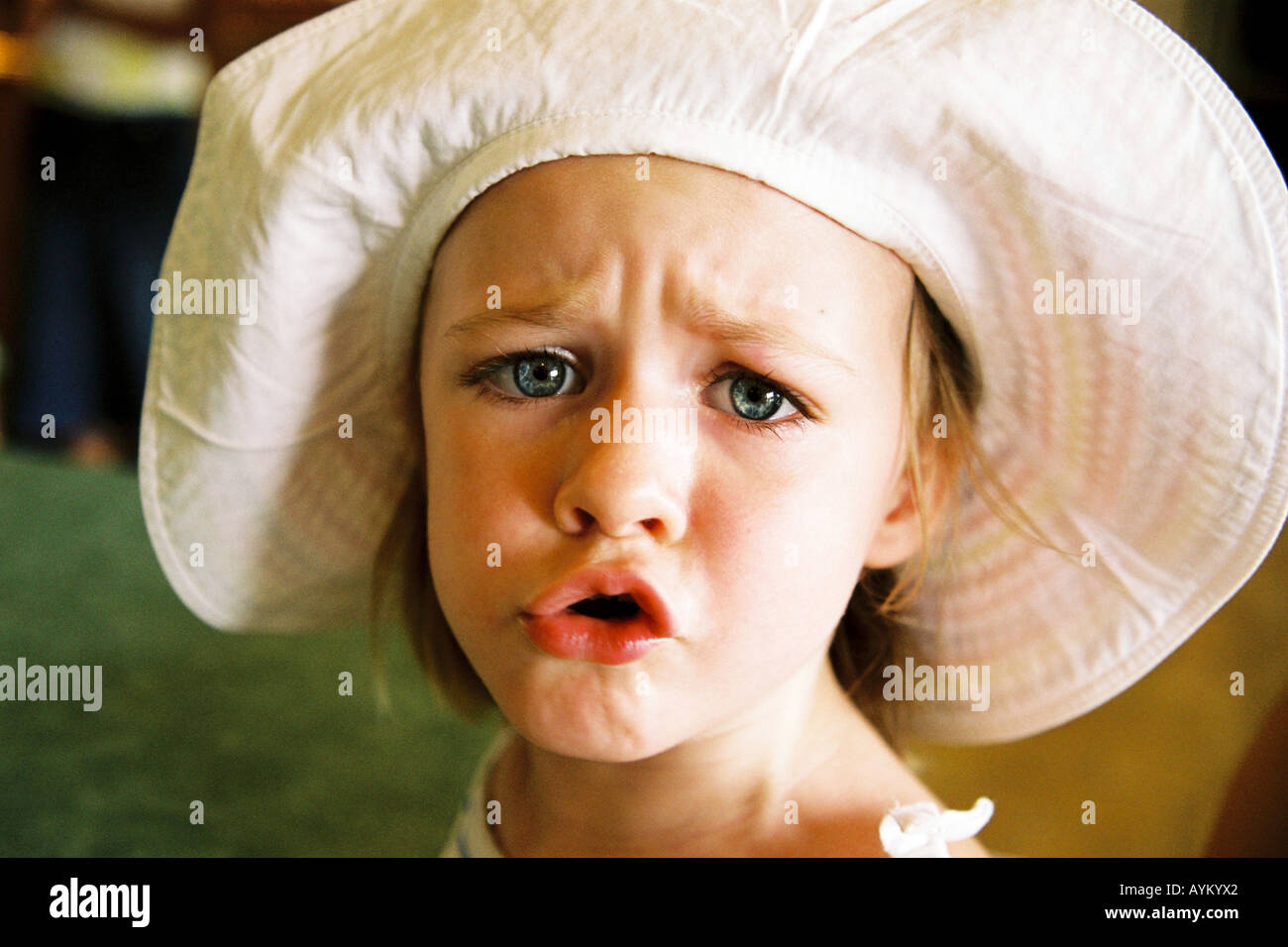 young girl smirking expression Stock Photo - Alamy