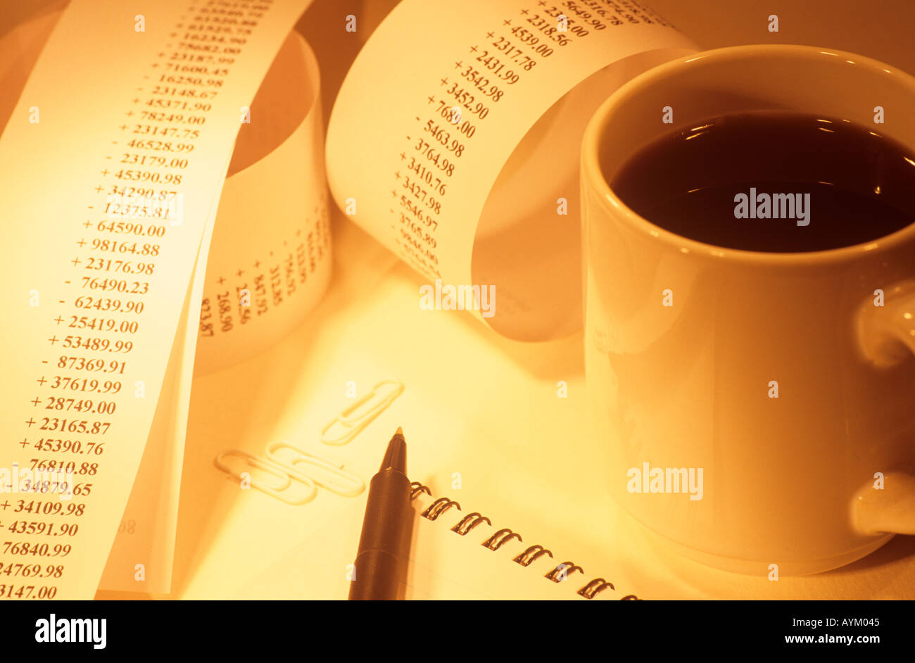 Notepad and pencil with listing tapes Stock Photo - Alamy