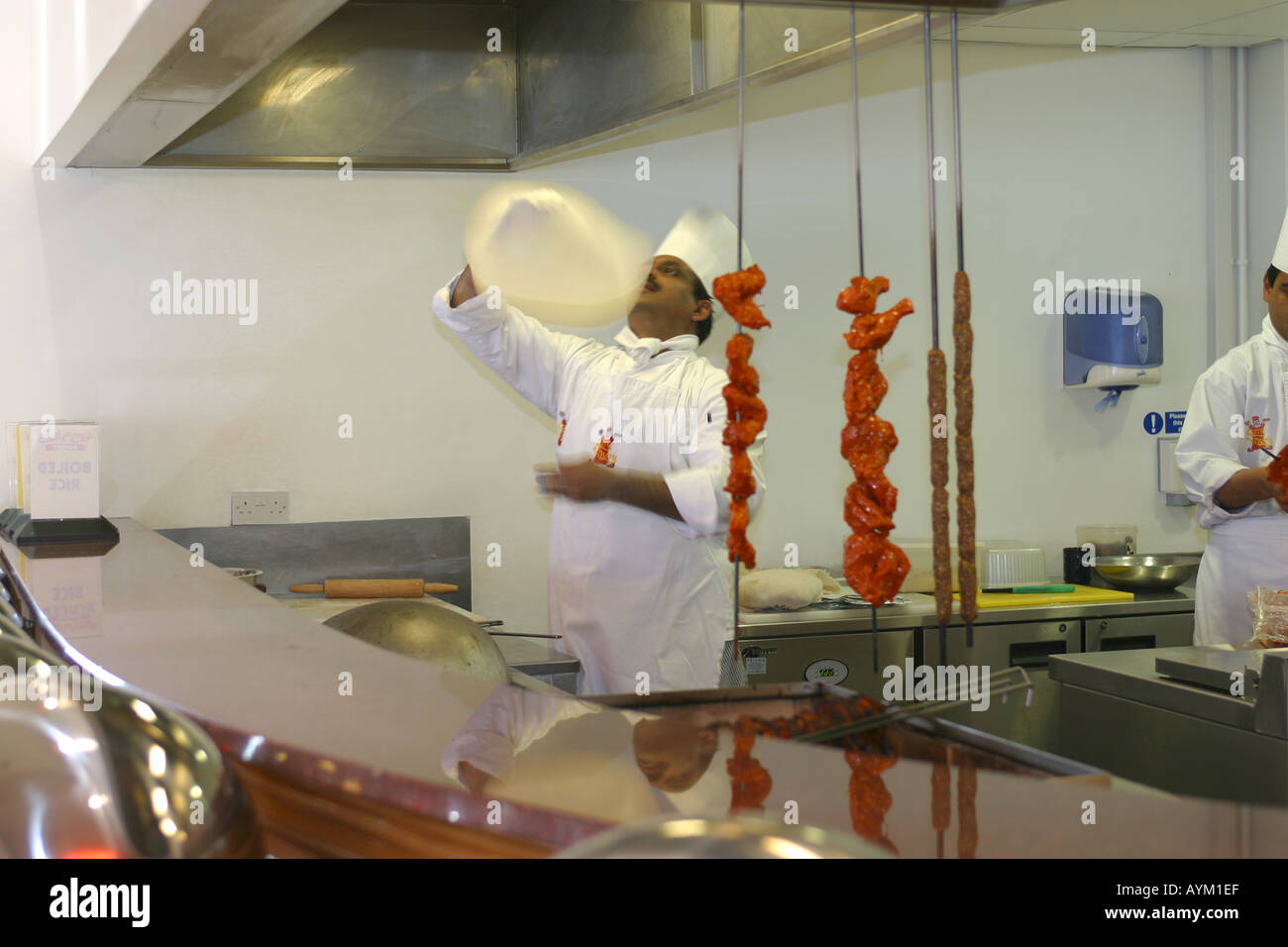 chefs cooking in Indian restaurant Stock Photo - Alamy