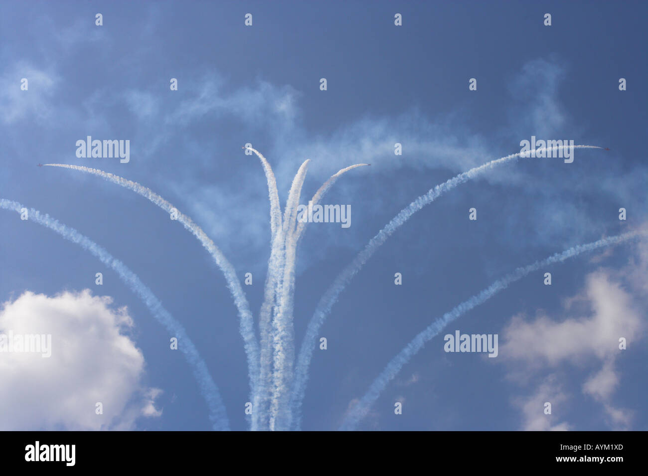 Red Arrows dispersing in a vertical cascade Stock Photo - Alamy