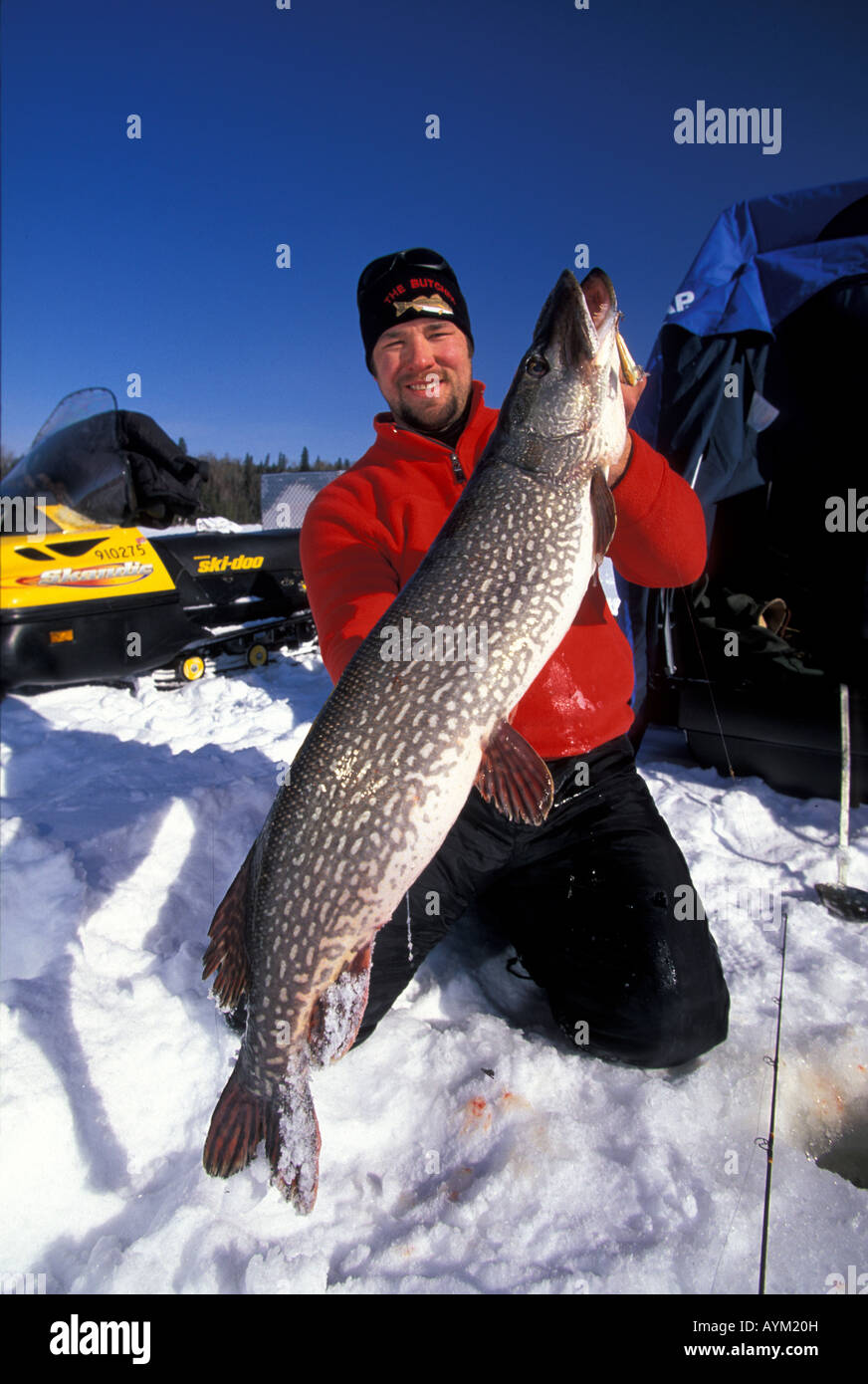 Ice fishing for pike hi-res stock photography and images - Alamy