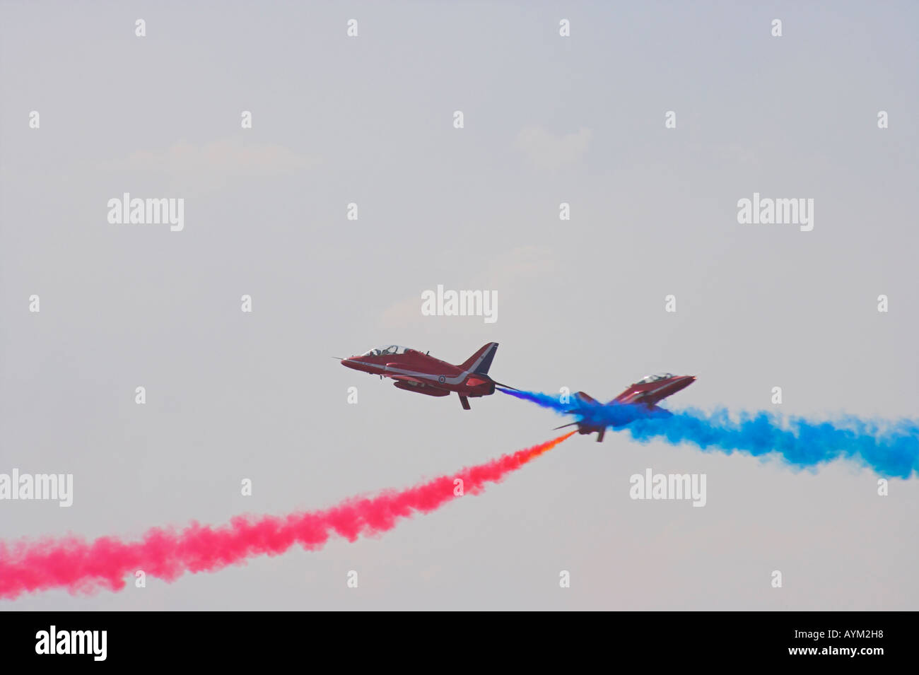 Red Arrows crossing and climbing at closing speed Stock Photo - Alamy