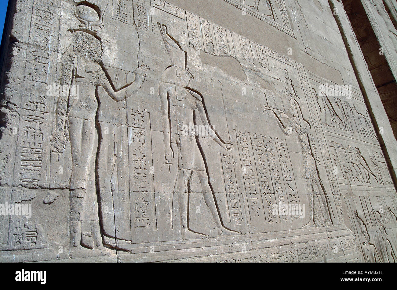 Temple wall carved hieroglyphic inscriptions and pictorial ...