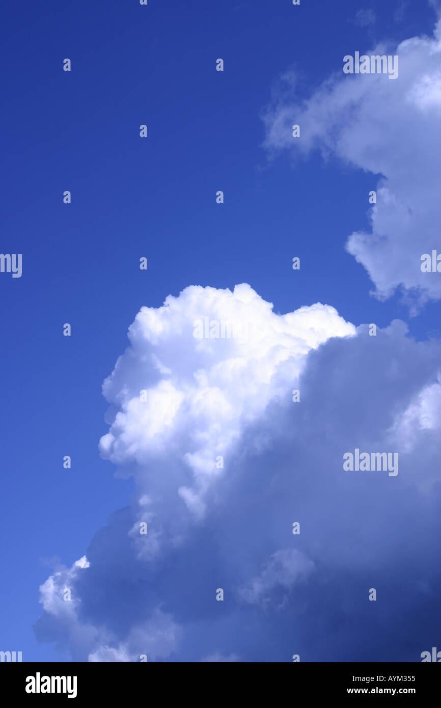 Fluffy white cloud in blue sky Stock Photo - Alamy