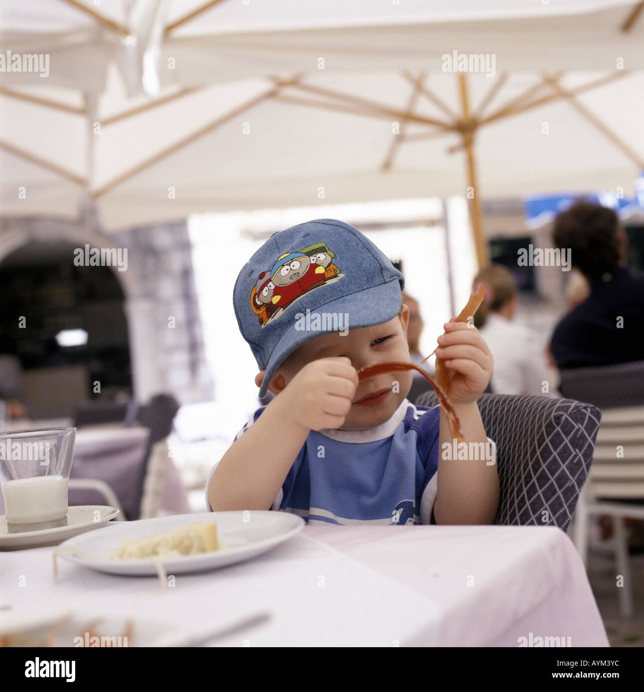 Boy eating pasta holiday hi-res stock photography and images - Alamy